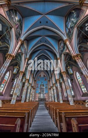 Beautiful pink and blue church interior with murals and altar Stock ...