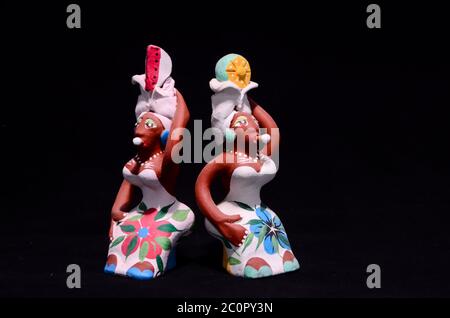 Clay Handmade Statue of a Cuban Woman on Black Background Stock Photo ...