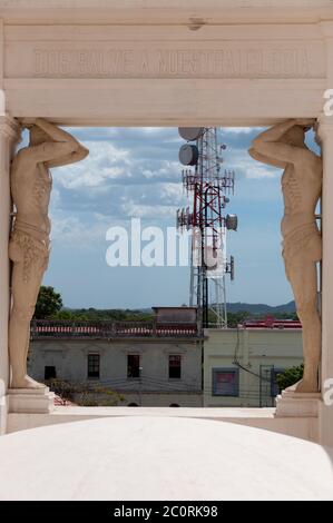 Two Tall stone Statue on Each Side of the Hall in front o houses and ...