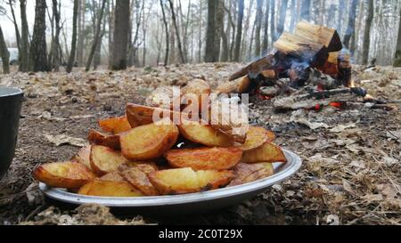 hot potato, potato on fire with flames Stock Photo - Alamy