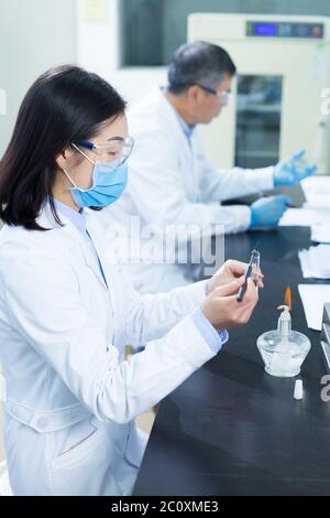people do medical experiment in lab Stock Photo - Alamy