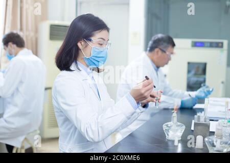 people do medical experiment in lab Stock Photo - Alamy