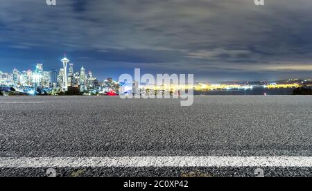 asphalt road with cityscape of seattle at night Stock Photo - Alamy