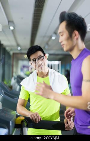 young asian people working out in modern gym Stock Photo - Alamy