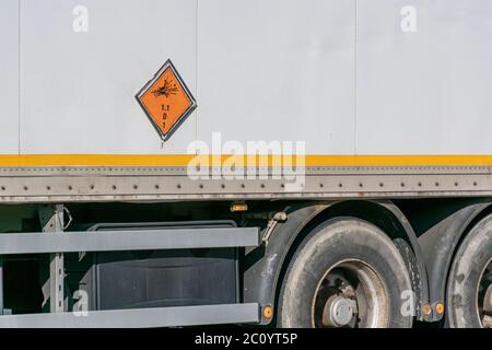 Truck transporting explosives, danger label according to the ADR ...