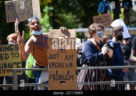 Brighton UK 13th June 2020 - A protester talks to a police liaison ...