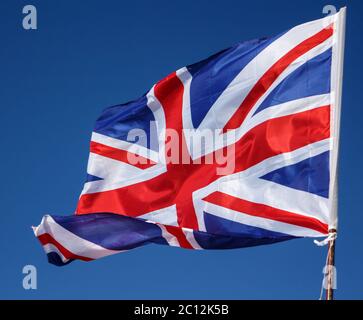 The Royal Standard of the United Kingdom waving the wind along with the ...
