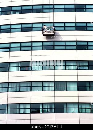Window cleaning scaffold on side of building Stock Photo - Alamy