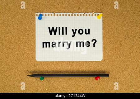 Will you marry me text note message pin on bulletin board Stock Photo ...
