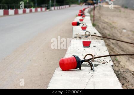 Signal lights on the fundamental blocks of concrete, fencing ...