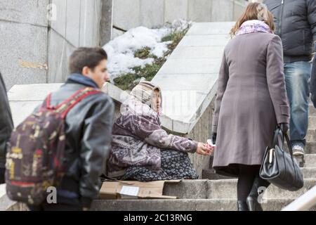 Gypsy woman begging for money outside Western Union, Madrid , Spain ...