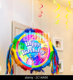 A broken pinata Stock Photo - Alamy