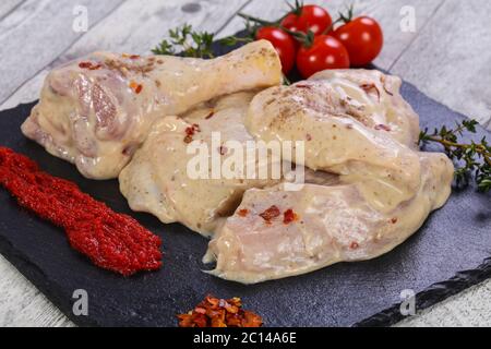 Marinated chicken parts ready for roast Stock Photo - Alamy
