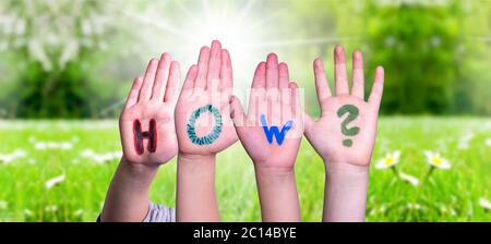 Children Hands Building Word How Are You, Grass Meadow Stock Photo - Alamy