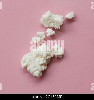 Cottage cheese over pink Stock Photo - Alamy