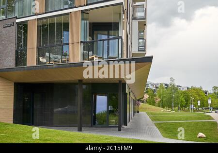 View of nice modern house in summer environment Stock Photo - Alamy