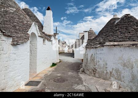 The beautiful town of Alberobello and its the traditional trulli houses ...