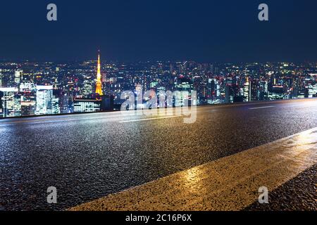 empty road with cityscape of tokyo at night Stock Photo - Alamy