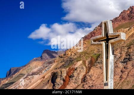 Cross in the argentinian Andes Stock Photo - Alamy