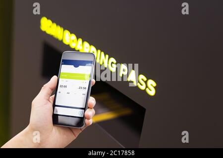 mobile phone with scan boarding pass in airport Stock Photo - Alamy