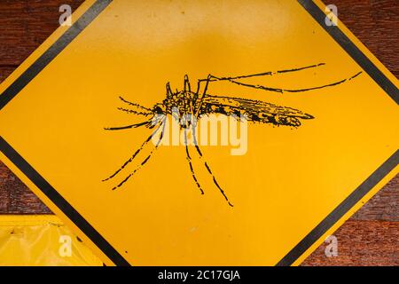 Mosquito warning sign, Alaska Stock Photo - Alamy