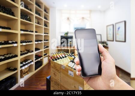 mobile phone in modern wine cellar Stock Photo - Alamy