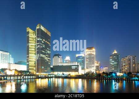 modern buildings near water at night Stock Photo - Alamy