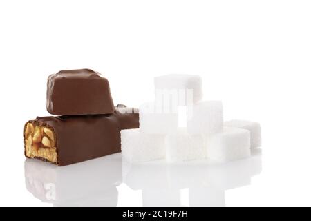 Chocolate bar and sugar cubes Stock Photo - Alamy