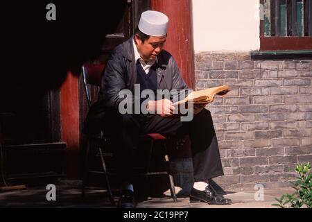 Hui Muslim men studying the Quran at madrassa classroom in Dongguan ...
