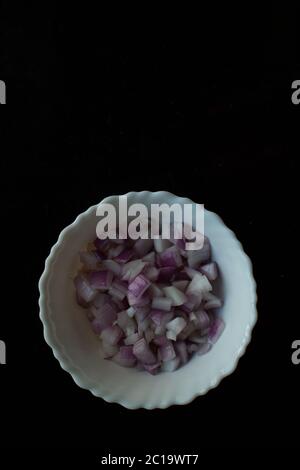 Onion cut into brunoise Stock Photo - Alamy