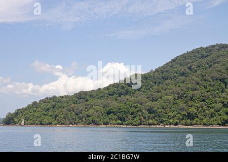 View of the Lokobe Strict Nature Reserve on Nosy Be Island from a boat ...