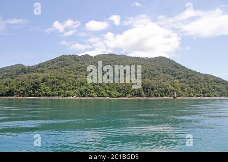 View of the Lokobe Strict Nature Reserve on Nosy Be Island from a boat ...