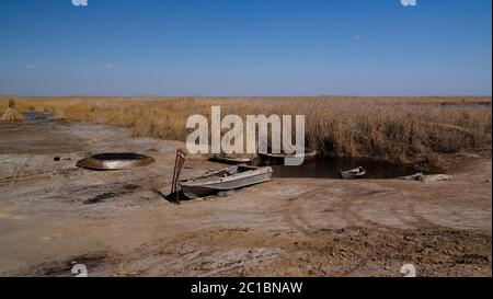 runed Urga fishing village at the shore of Sudochye lake aka part of ...