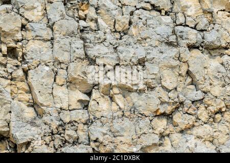 Textured stone background Rubble ballast in natural form in the rock ...