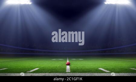Low angle view of American football player looking away Stock Photo - Alamy