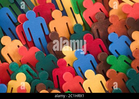 Colorful painted group of people figures on white background Stock ...