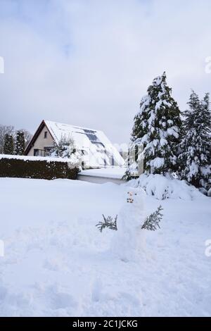 Snow-covered solar system on a house in winter. Solar system in winter ...