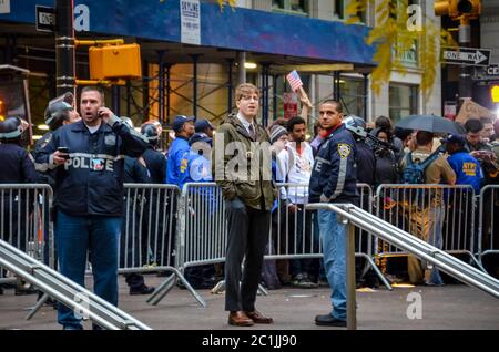 Plainclothes anti-crime police officers in New York City approach a ...
