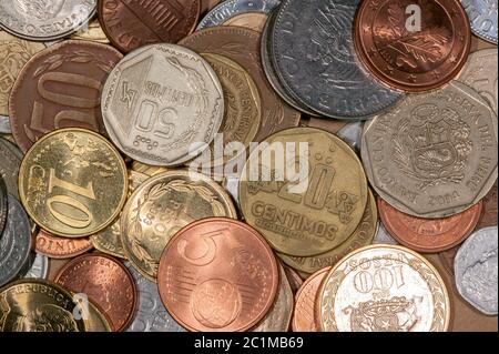 A lot of differente colored world coins Stock Photo - Alamy