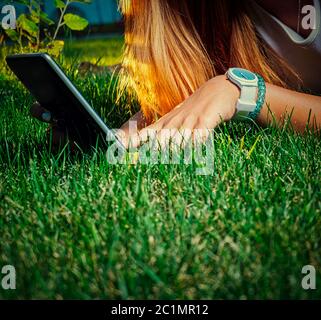 Young student relax in the park. work with laptop in green grass Stock ...