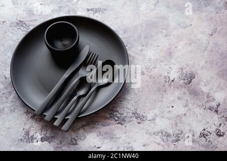 Empty ceramic marble plate on marble table background. Copy space. Menu ...