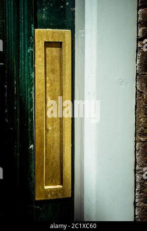 vertical letterbox in painted vintage door Stock Photo - Alamy