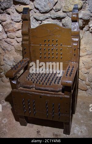 Spiked chair at the Torture Museum in Amsterdam, Netherlands Stock ...
