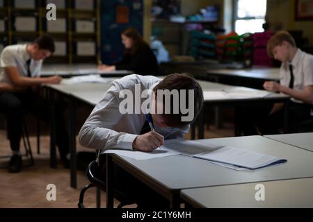 A year 10 pupil writing. Ortu Gable Hall School in Corringham, Essex ...