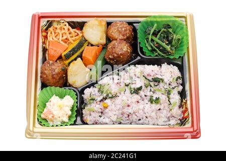 Plastic lunch box with tasty bento cake for Valentine's Day on red background Stock Photo - Alamy