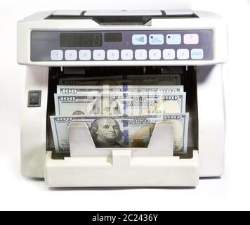 Close-up of a money counting machine used for counting banknotes. The ...