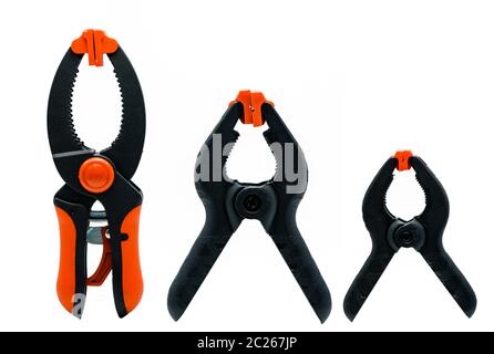 Black and orange spring clamp isolated on white background. Set of ...