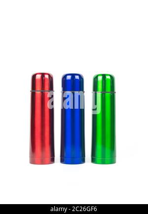 Red and blue insulated stainless steel tumblers on white background ...