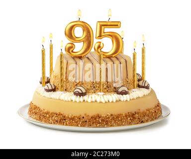 Number 95 golden festive burning candles in a cake, wooden holiday ...