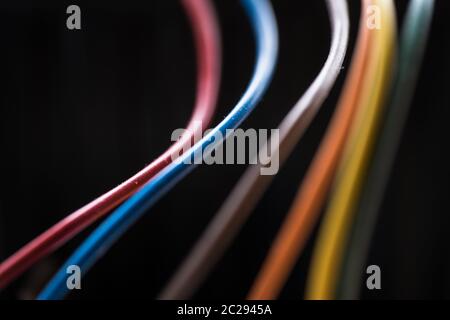 Colored power cables that come from a transformer Stock Photo - Alamy